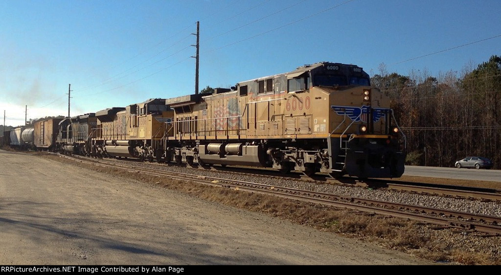 UP 6000, 8508, and CSX SD40-2 8066 roll NB